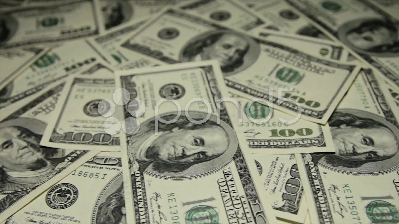 A lot of money on the table. Slider shot.. Stock Footage - YouTube
