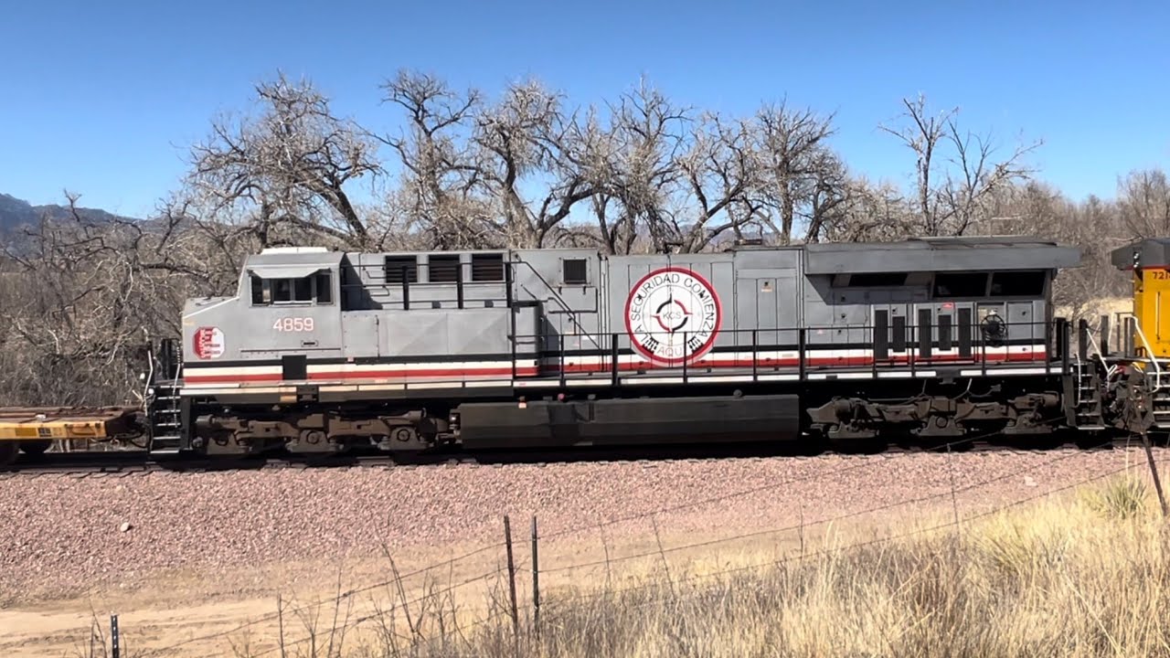 UP #7214 Leading Empty Military Train With KCS Safety Unit Over The Bridge 3/5/23 - YouTube