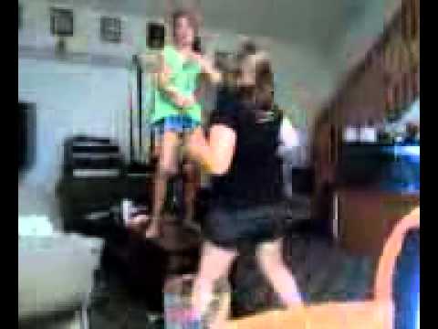 Sarah shakin' her butt and Emily dancing in the background