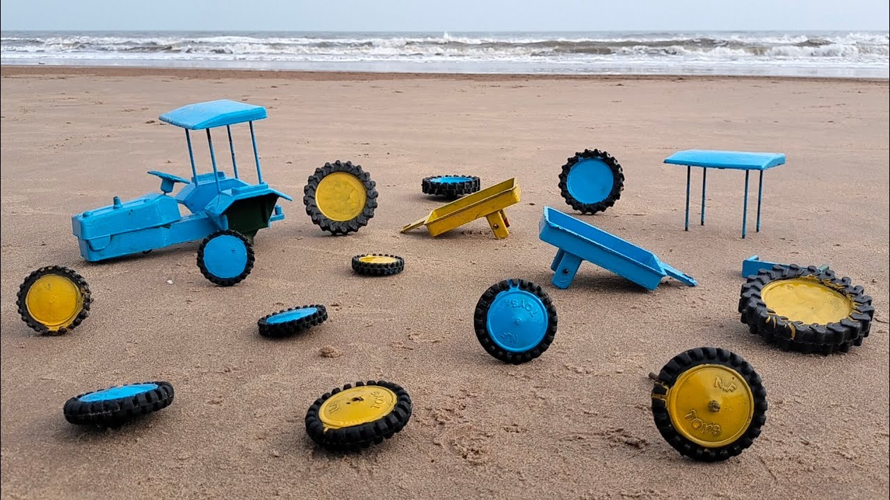 Mini tractor sand loading beach diy tractor video - YouTube