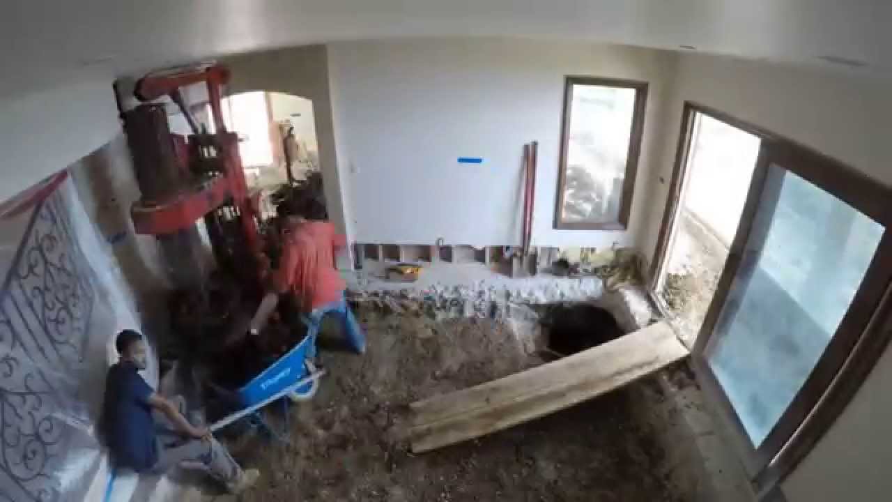 Limited Access Drilling Rig drilling with stems inside a house. - YouTube