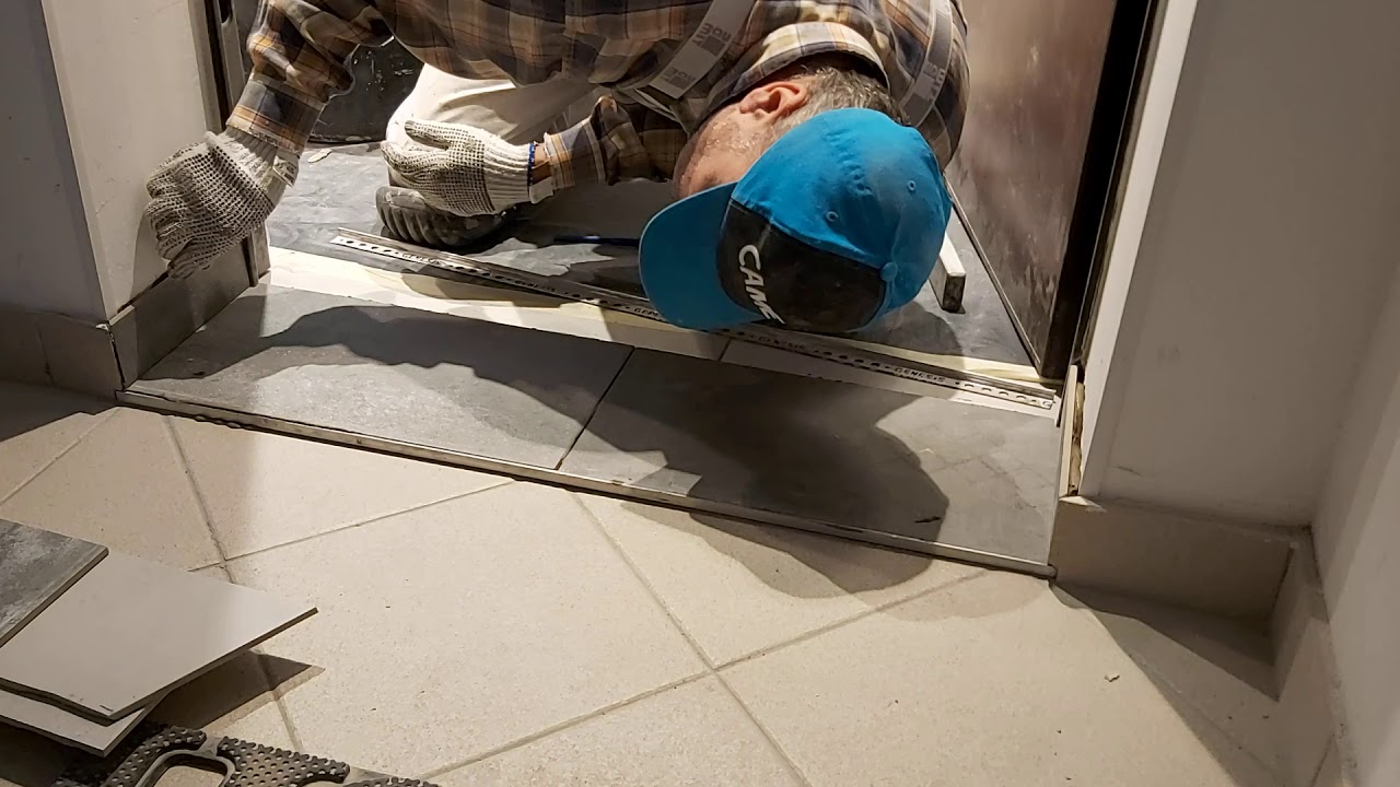 How to install a ceramic tiles on the threshold - YouTube