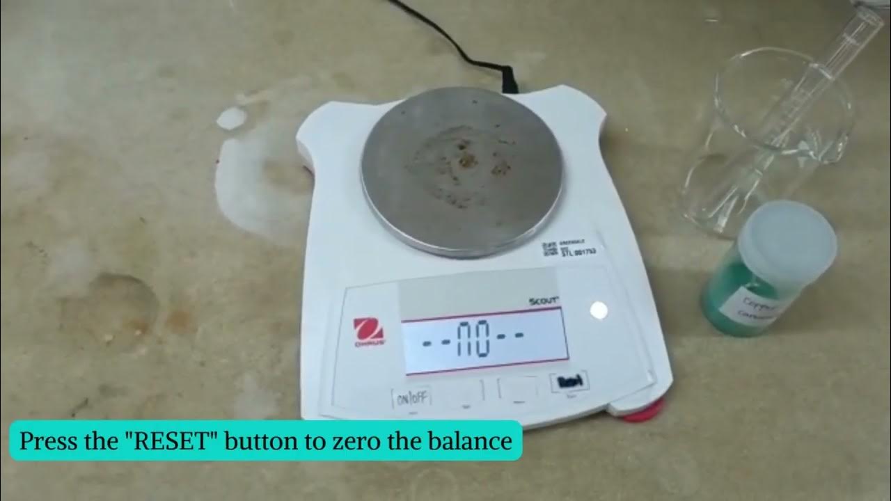 Use of electronic mass balance (with taring) - YouTube