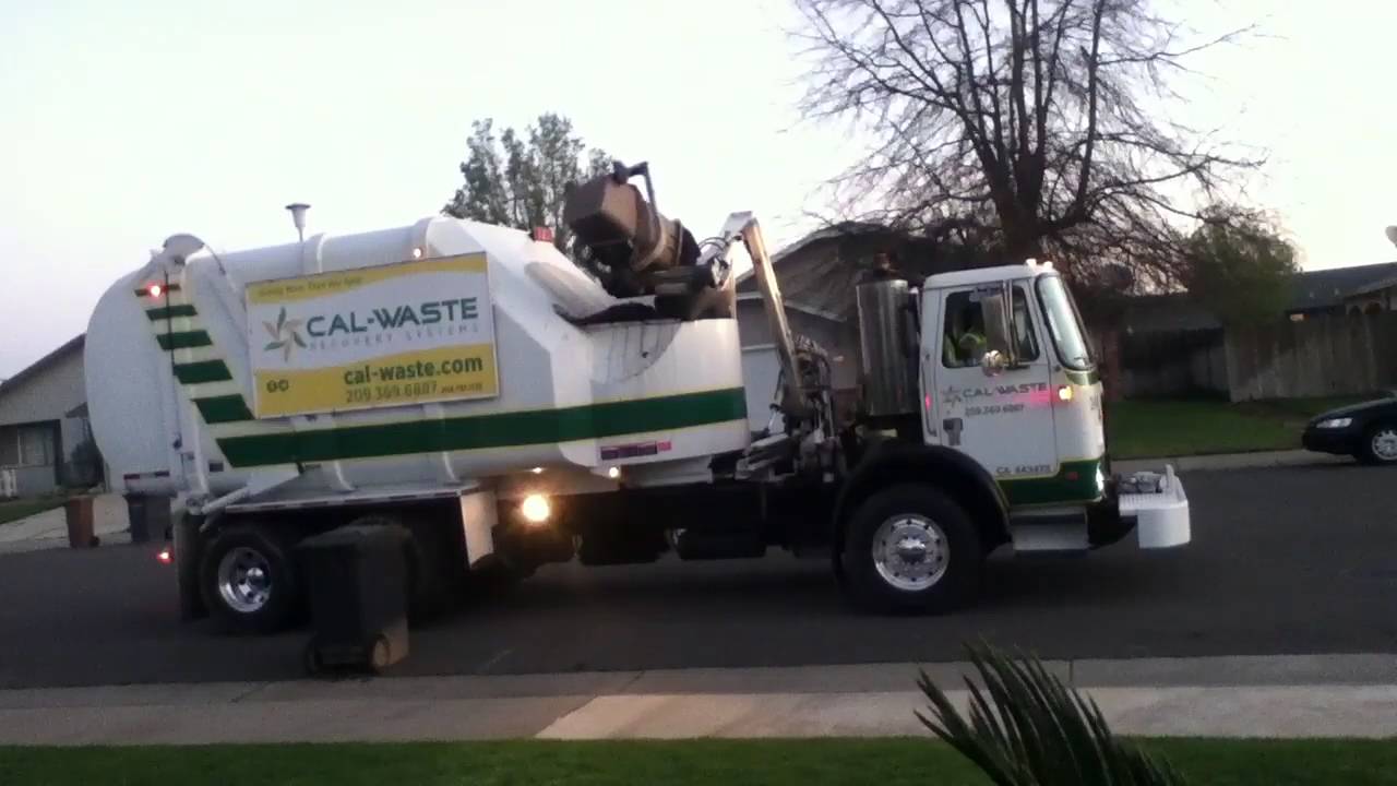 Cal waste truck collecting waste - YouTube
