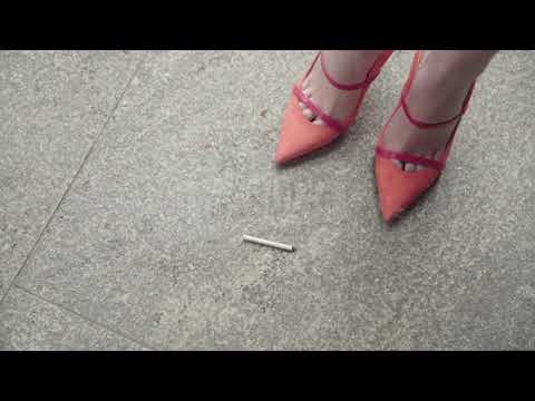 Heels crush cigarette