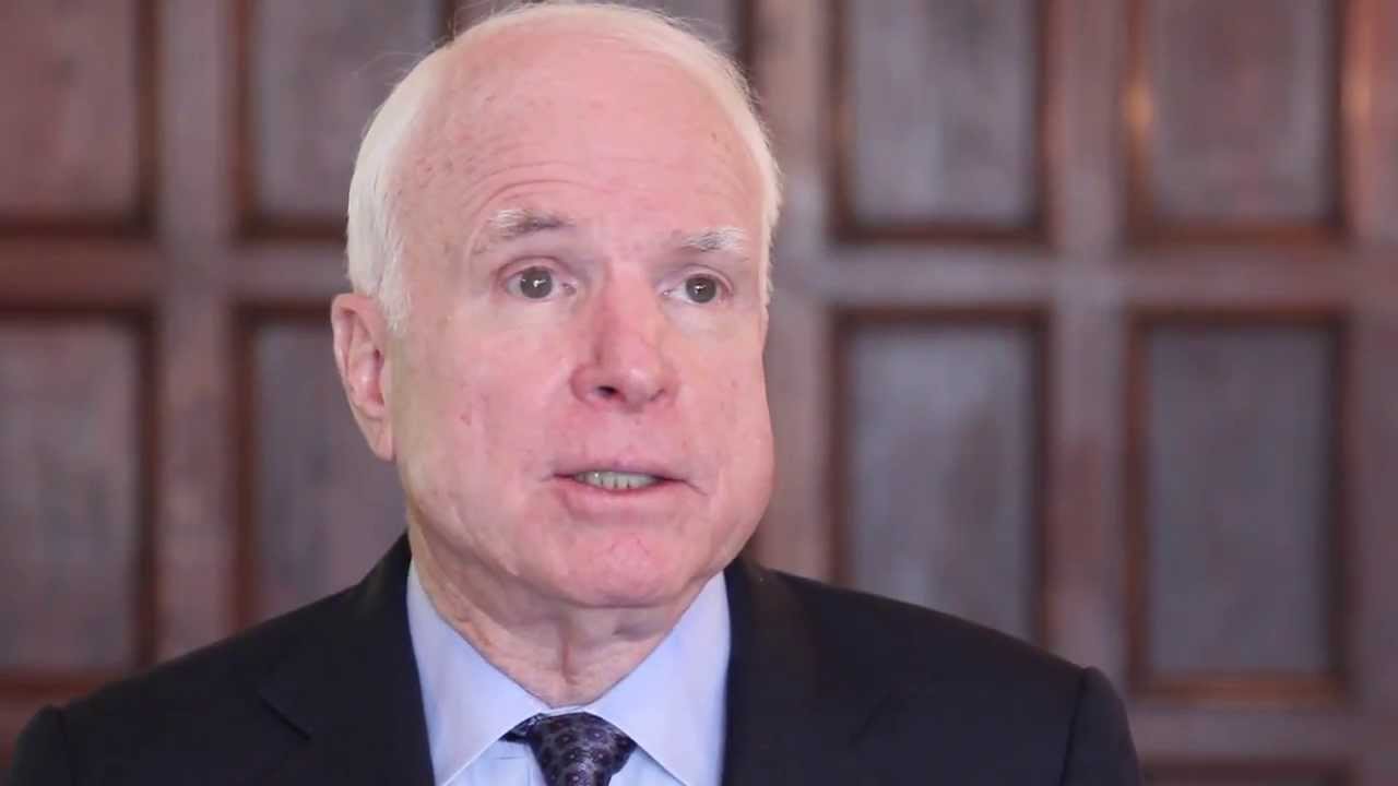 Sen. John McCain talks with The Gate reporters Noah Weiland and William ...