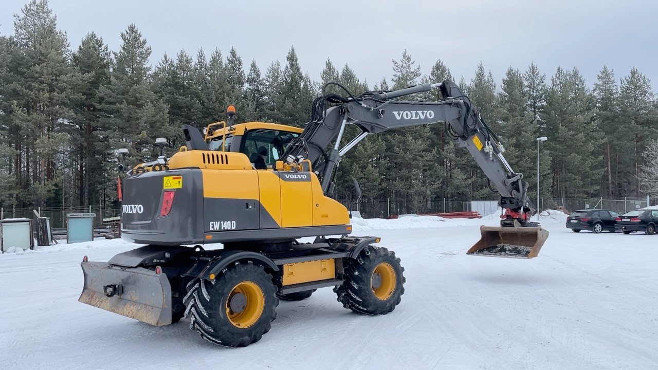 Köp Hjulgrävare Volvo EW140D med tiltrotator på Klaravik - YouTube