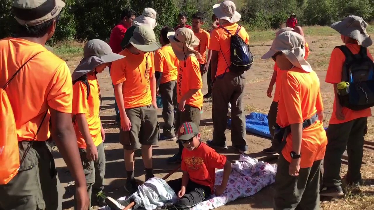 Boy scouts doing First Aid requirement on cub scout - YouTube
