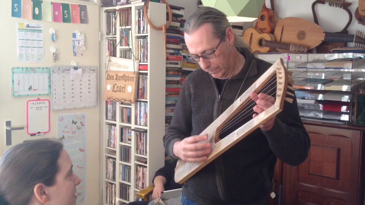 Spike trying out his new Trossingen Lyre (6th century germanic lyre ...