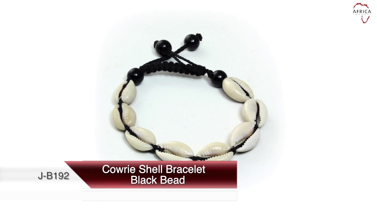 Cowrie shell bracelet: black bead from Africa Imports - YouTube