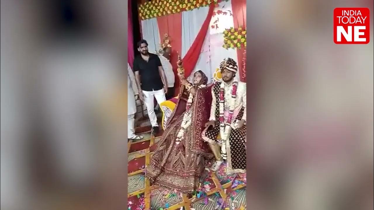 #Watch Viral video shows bride firing gun during wedding netizens say 'groom is so scared' - YouTube