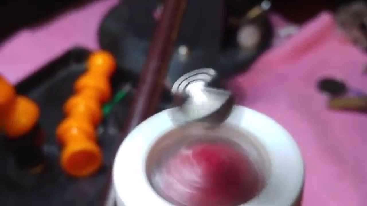 Precession like motion of a trapped magnet (20151031 210155) - YouTube