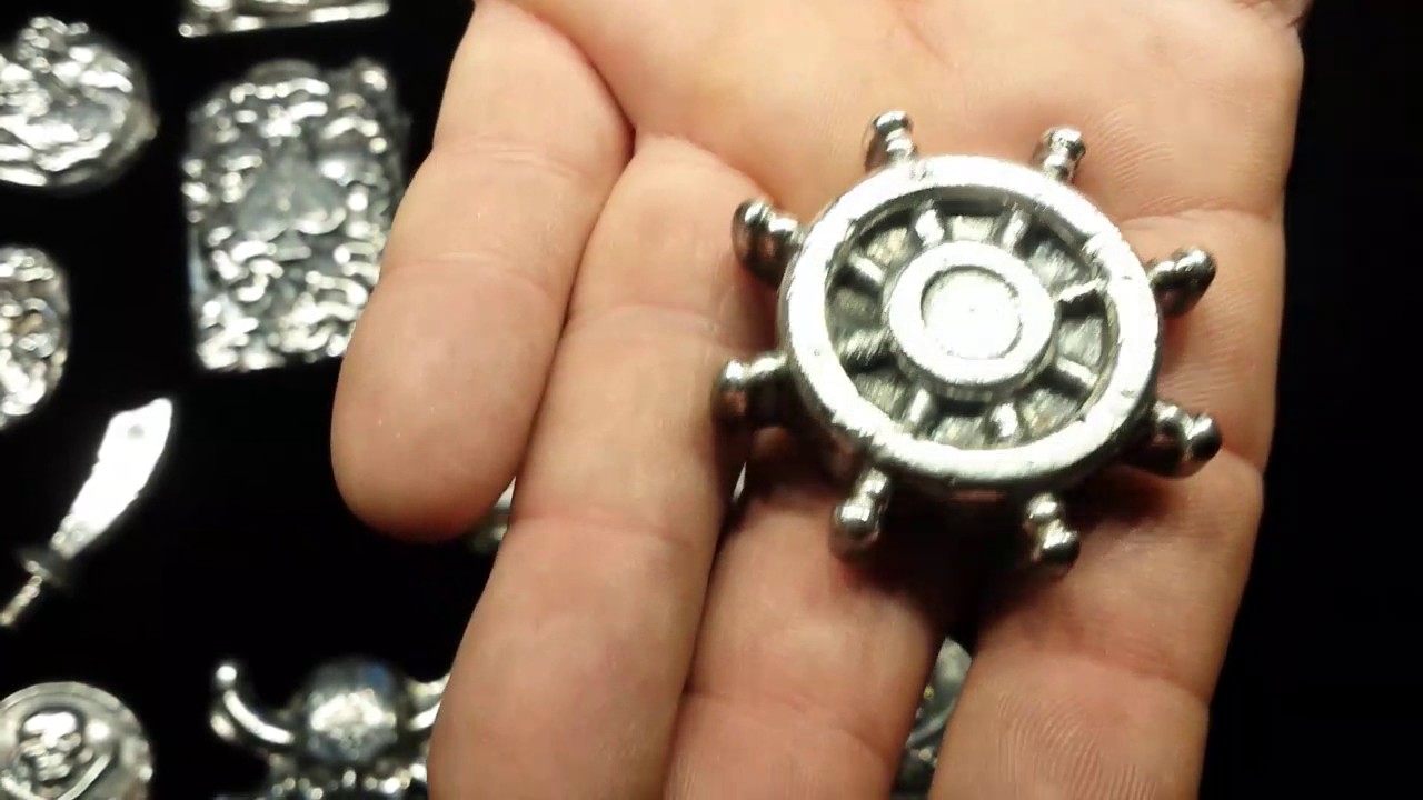 Hand poured silver for the new year. - YouTube