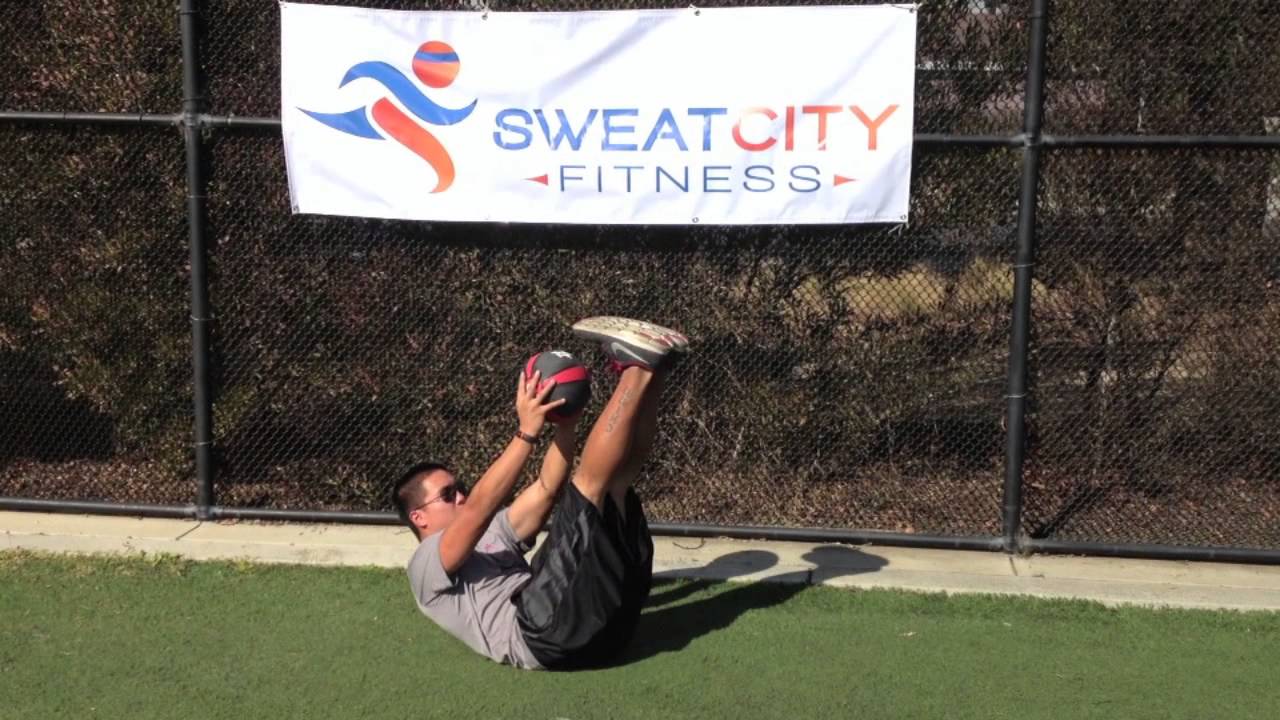 Med Ball Drills: Leg Raise w Toe Touch Crunch | Sweat City Athletic ...