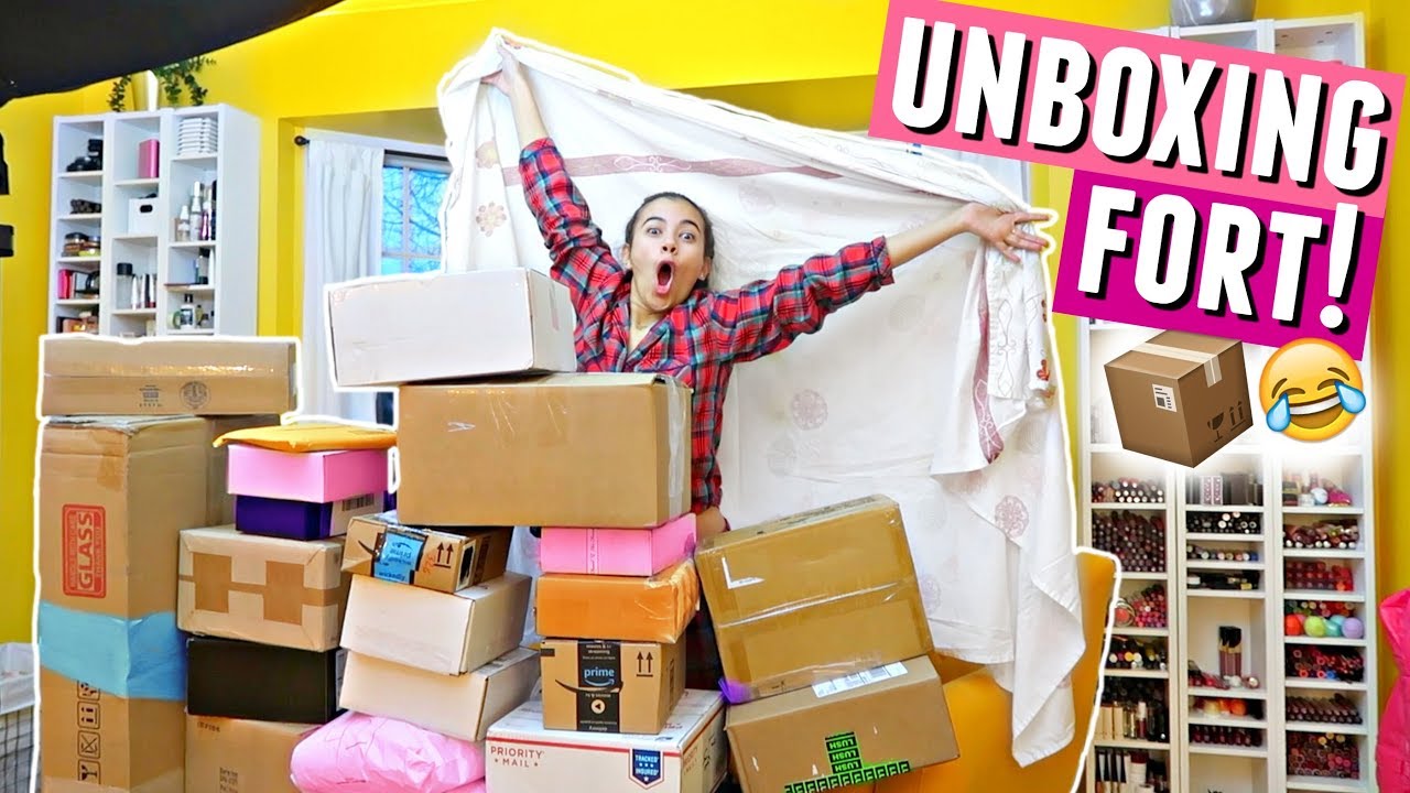 I made a fort out of all my packages and then did an unboxing haul ...