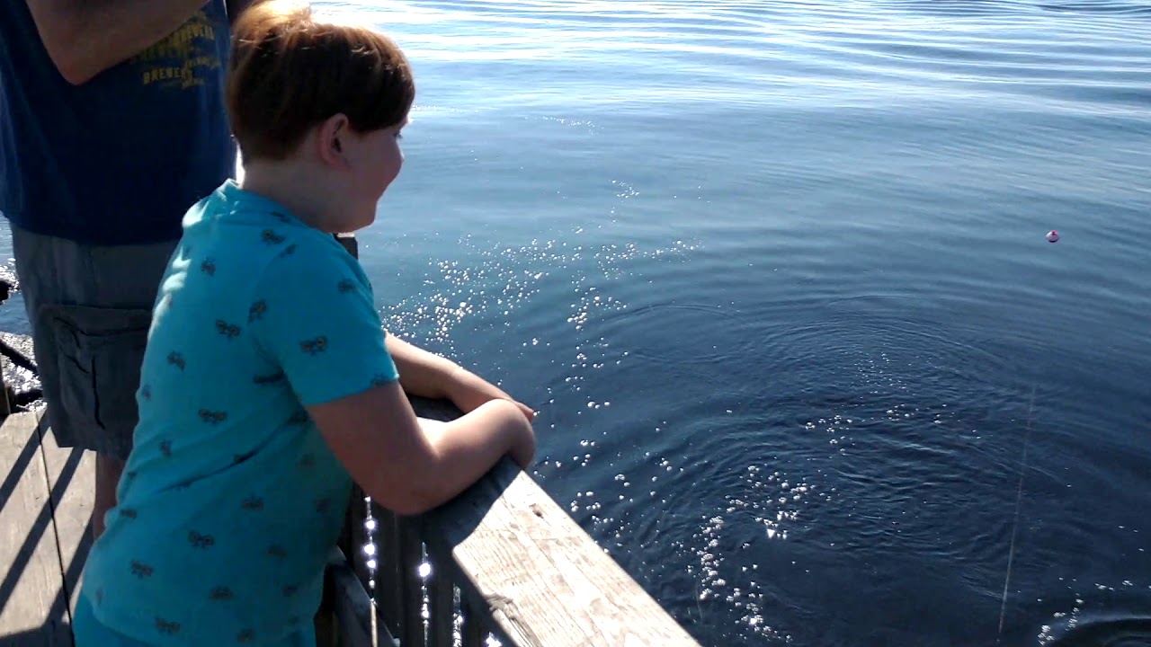 Mason catching his first fish with his new fishing pole from Grandpa ...