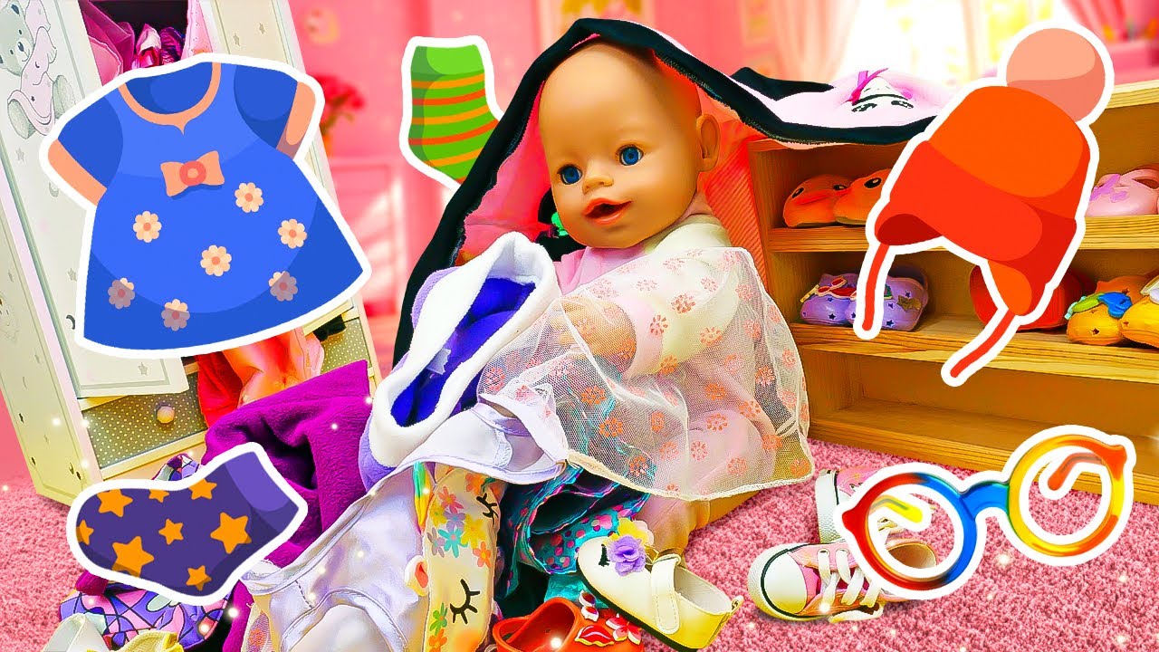 Baby Emily doll and Grace the babysitter put clothes and shoes in their ...