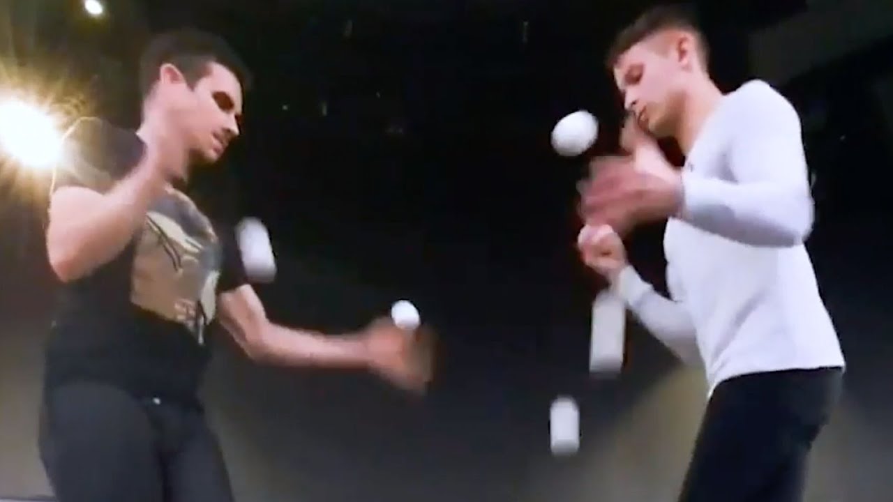 Two Guys Move in Circle and Juggle Multiple Bouncing Balls at Same Time ...