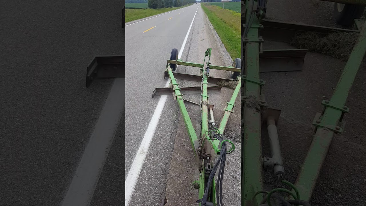 Laneway grader grading shoulder. To view Shoulder Grader https://www ...