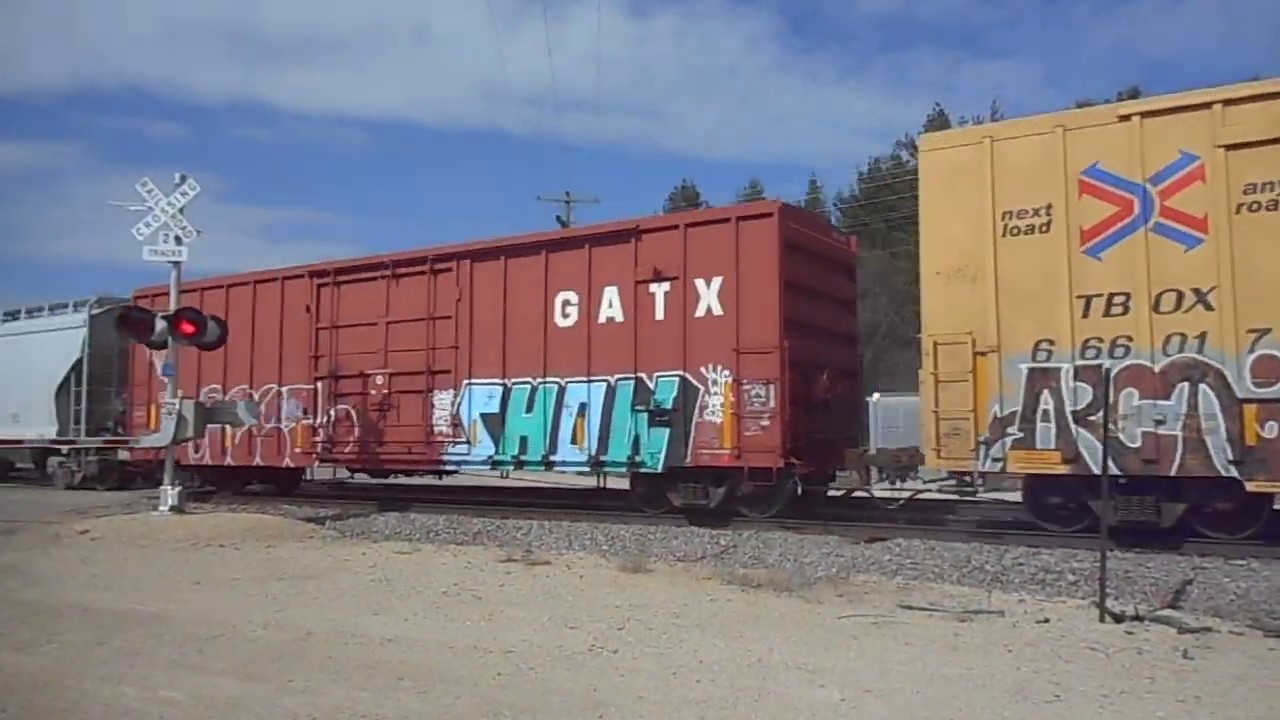 NS 1838 SD70ACC (2nd unit) w/BNSF 7996 leading H-NNTWNSI (extra horns ...