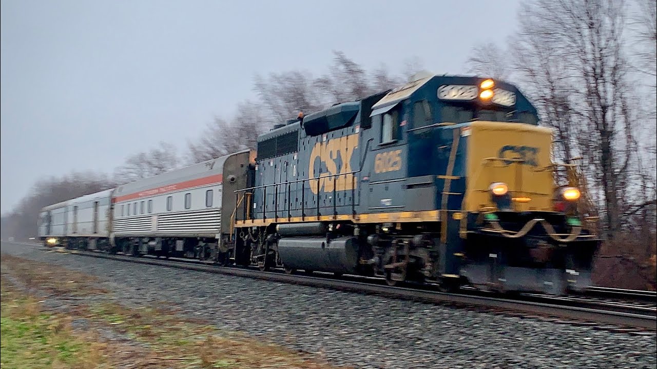 CSX Geometry Train W001 with Southern Pacific & CSX Cars + UP SD70AH ...