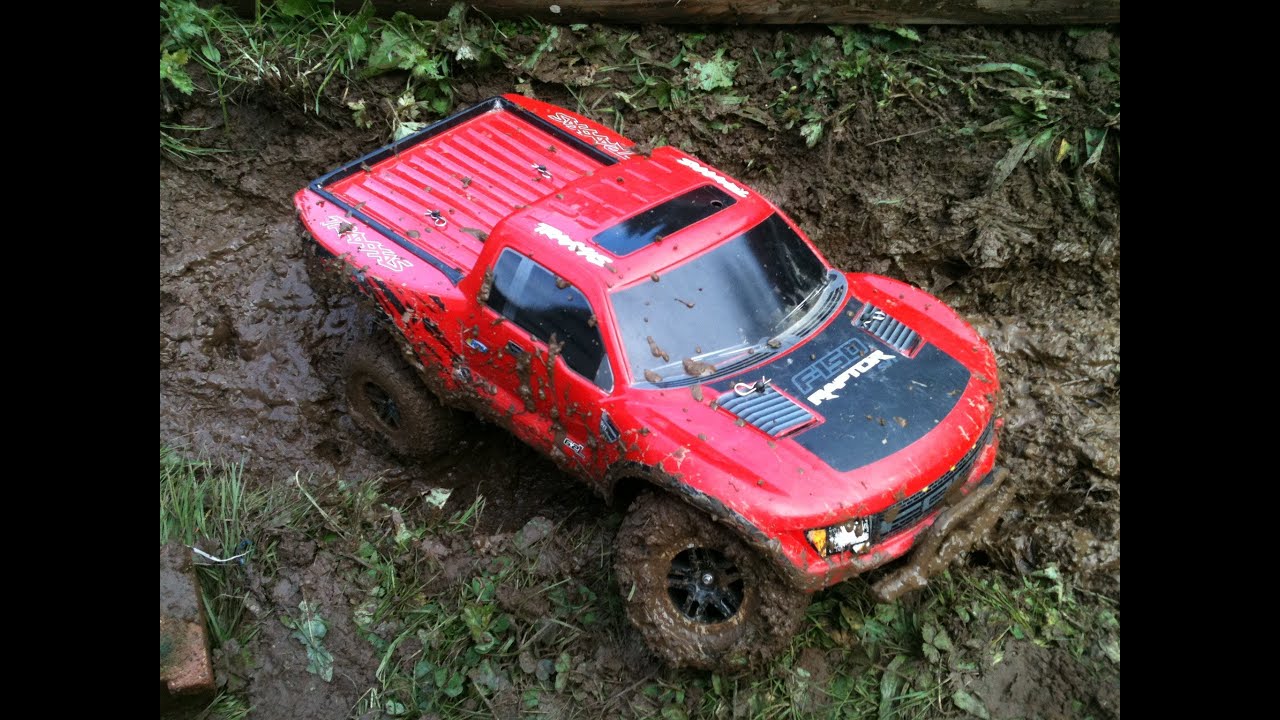 Traxxas slash Project Velociraptor 2X4 in my backyard mud pit R.C ...