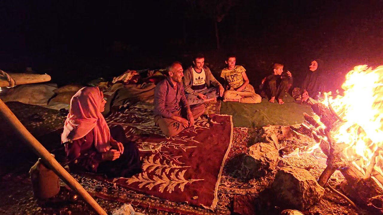 Nomadic family gathering at a Beautiful Night after a long journey ...