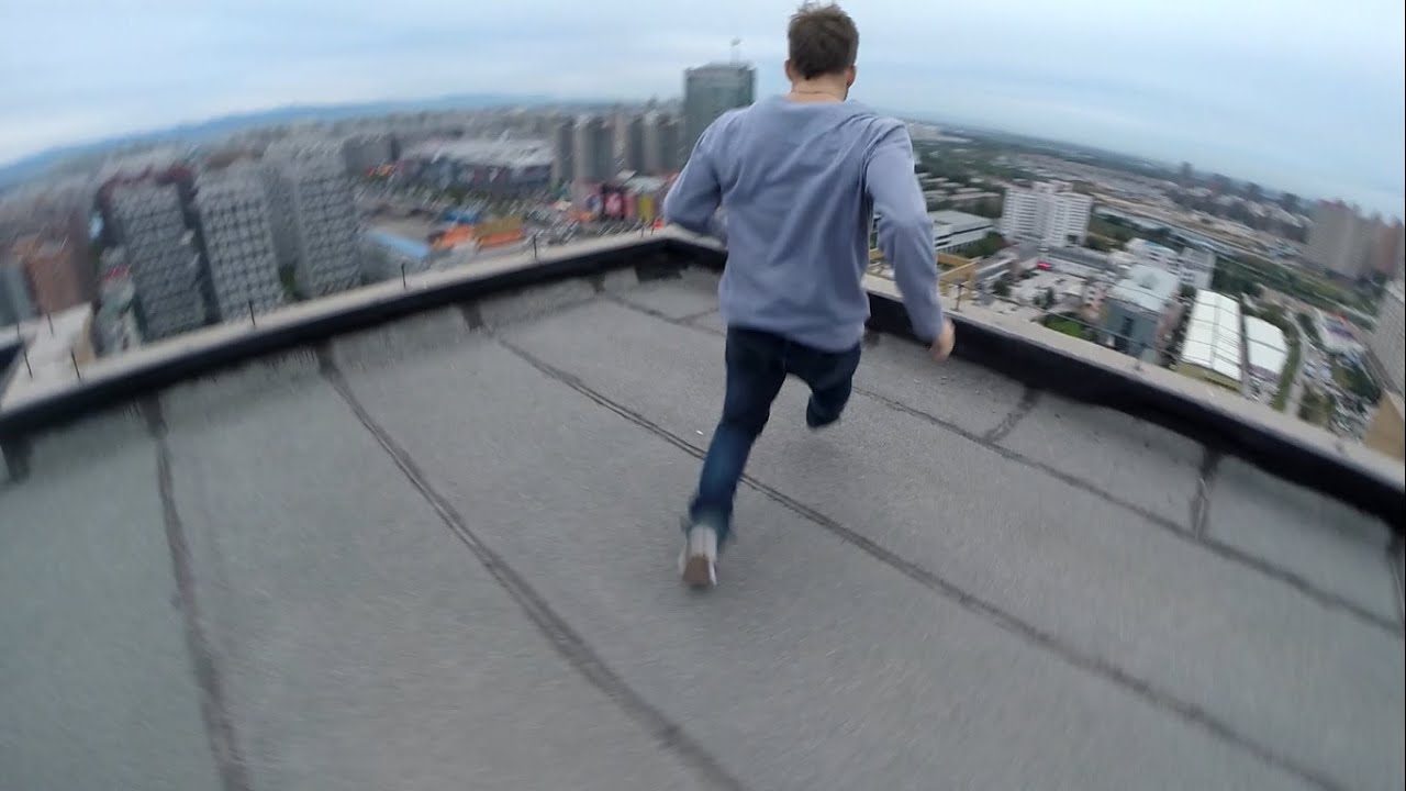 Running on the roof (Beijing city) - YouTube