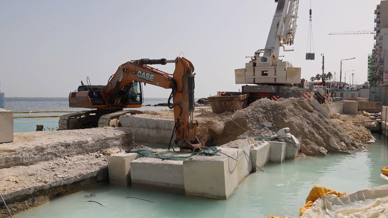 JIBDA L-BINI MILL-ĠDID TAL-BREAKWATER F’BUĠIBBA - YouTube