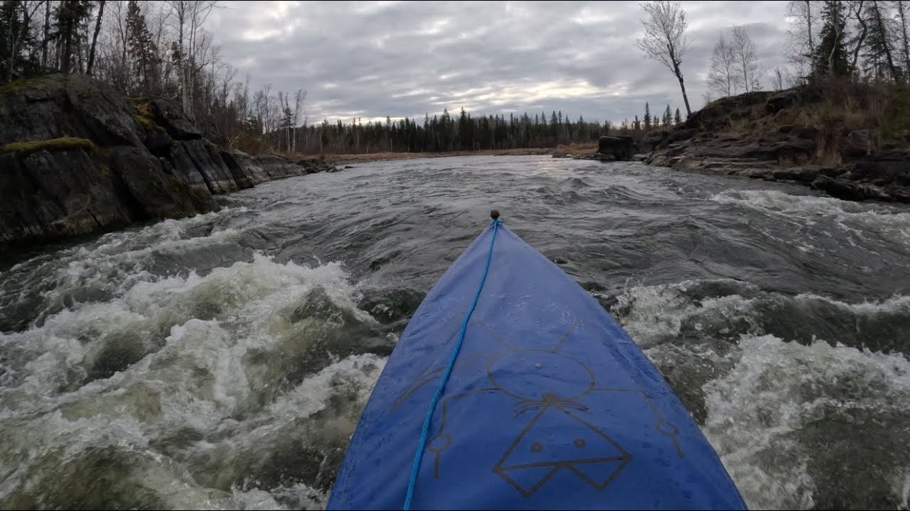 " Attempting " to run up rapids with my invention and a small outboard ...