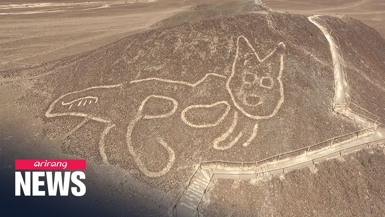 Drone footage reveals ancient cat etched into Peru hillside - YouTube