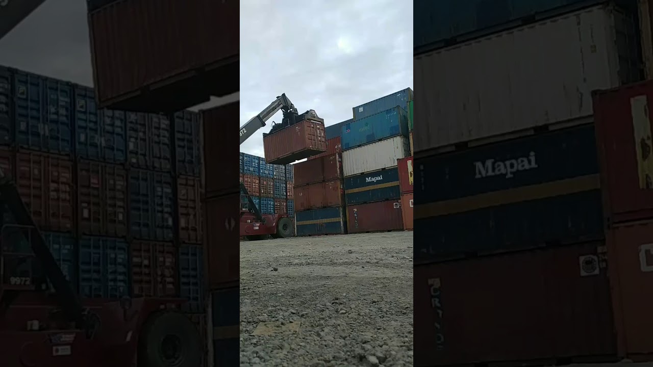 Taylor reach stacker stack's five high - YouTube