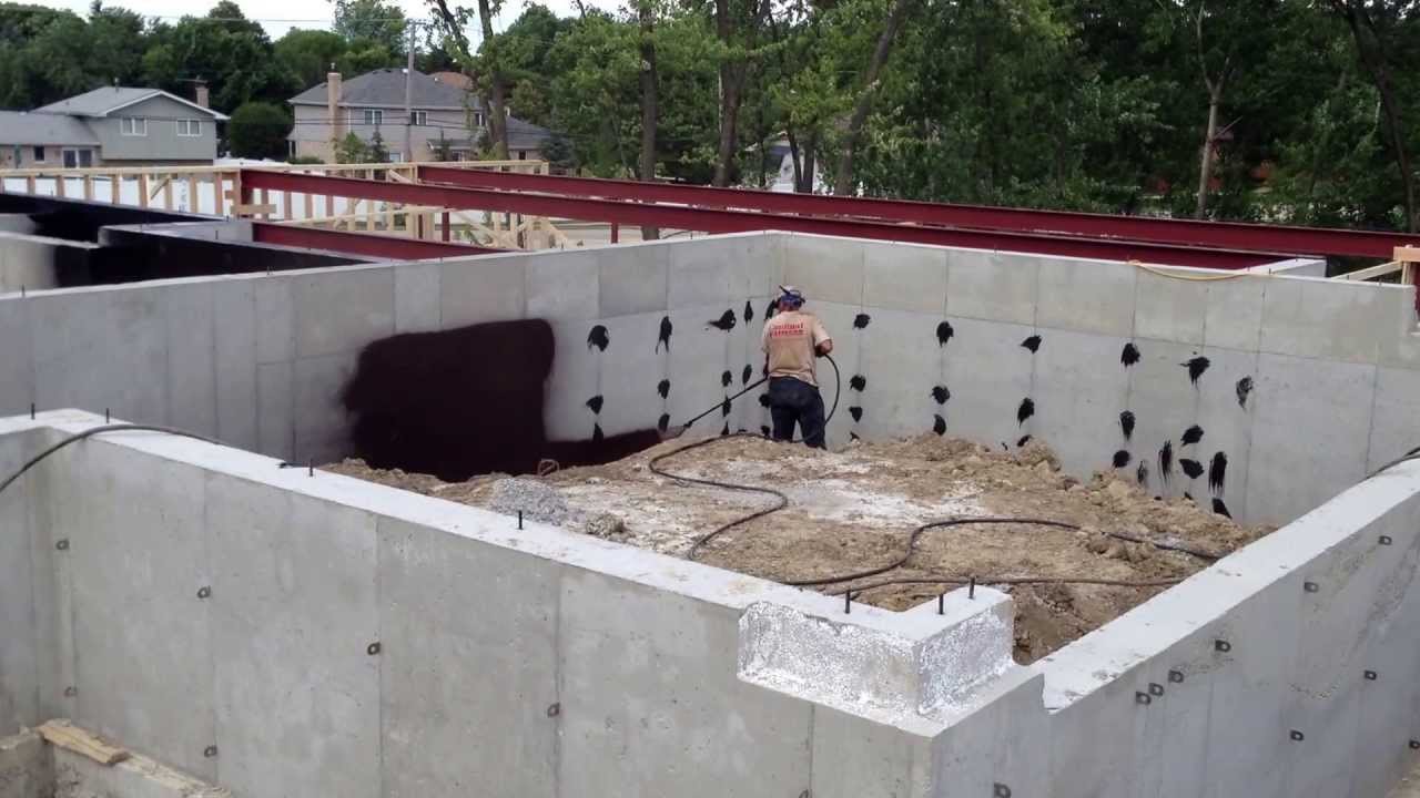 Damp-proofing a foundation on new construction - YouTube