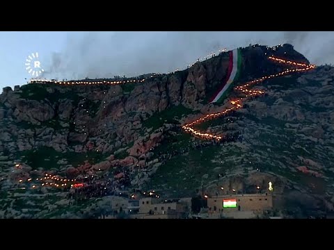 Watch: Iraqi Kurds celebrate Nowruz with torchlit mountain procession