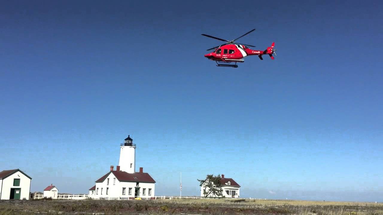 Canadian Coast Guard helicopter at New Dungeness Lighthouse - YouTube