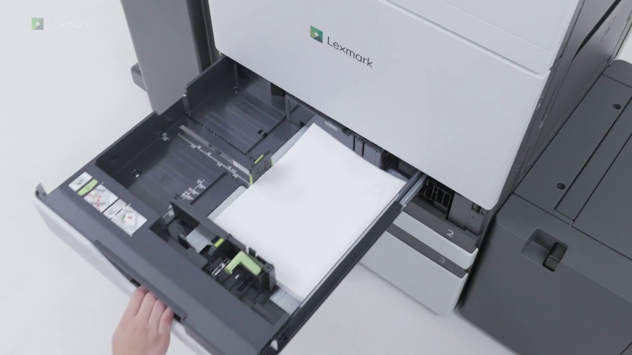 CS920/CX920 Series—Loading trays with an optional finisher attached to ...