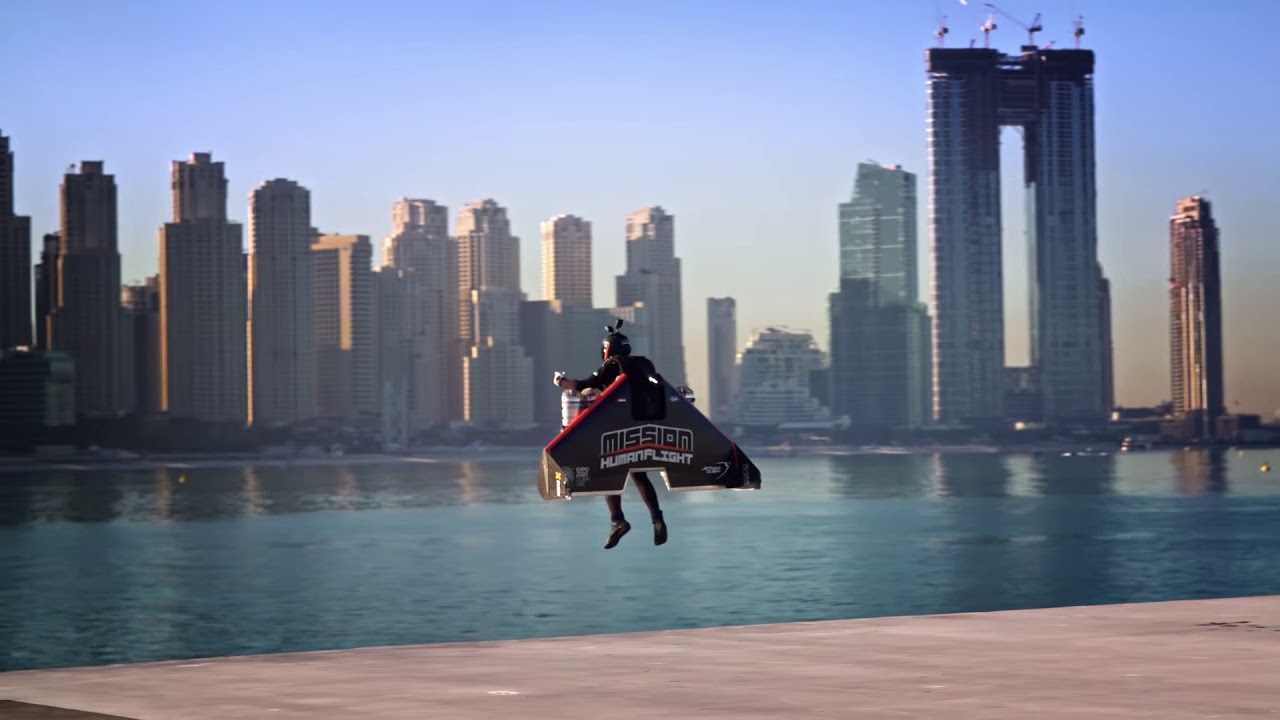 Jetman Dubai Takeoff , a man is flying with a special Suit in Dubai ...