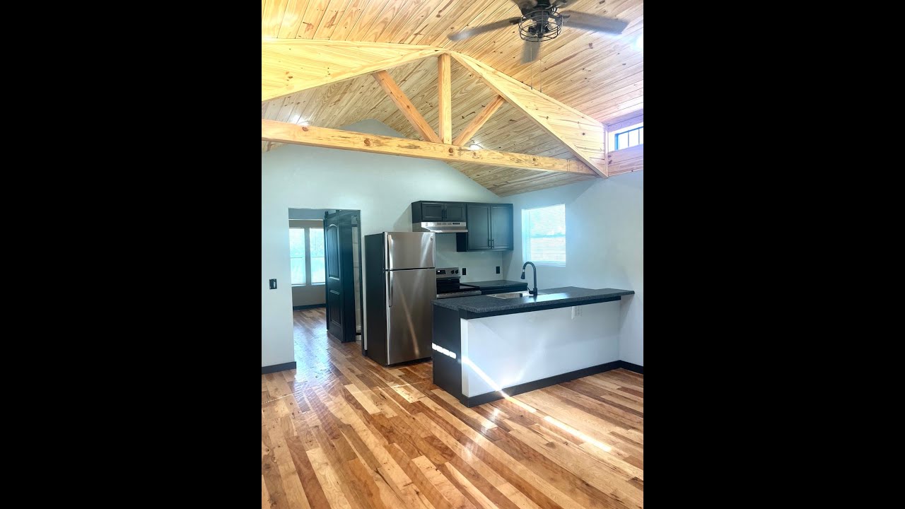 Seanna Fully Finished D-Log Sided Cabin 16x40 Tiny Home - YouTube