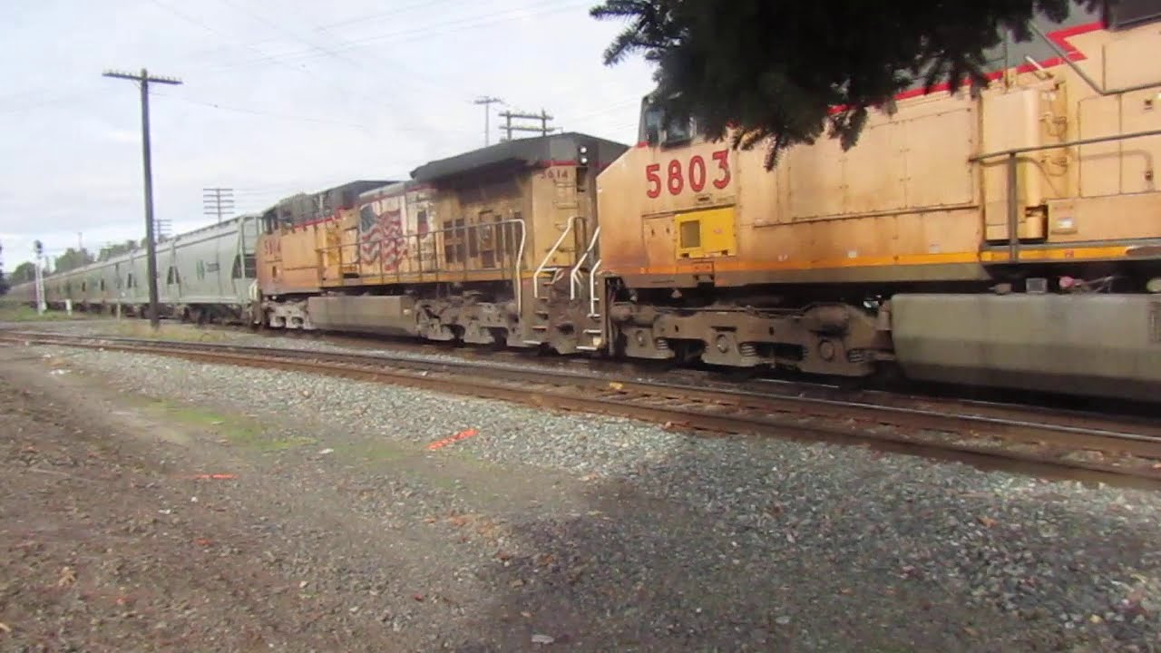 UP, CP & a whole lotta Canpotex on this train going through Peninsula ...