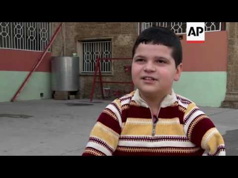 Courage of boy with no hands who taught himself to write with his foot ...