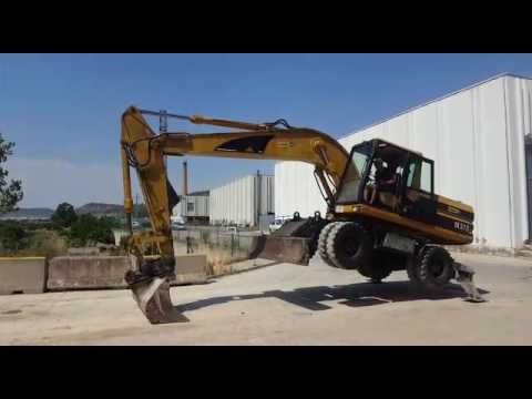 CATERPILLAR M318 - YouTube