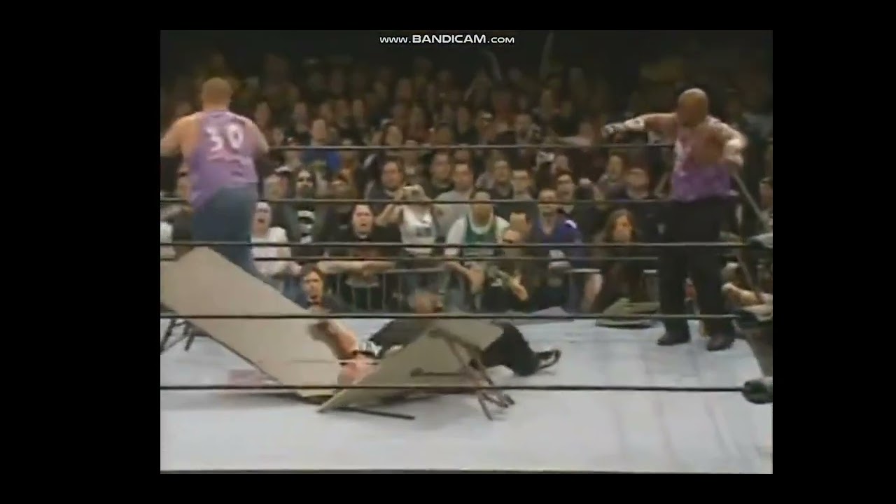 Devon Dudley powerbombs Sandman through table - YouTube