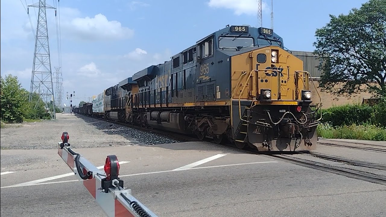 CSX 965 & CSX 3027 ES44AC leads the CSX L302-10 on the CSX Detroit ...