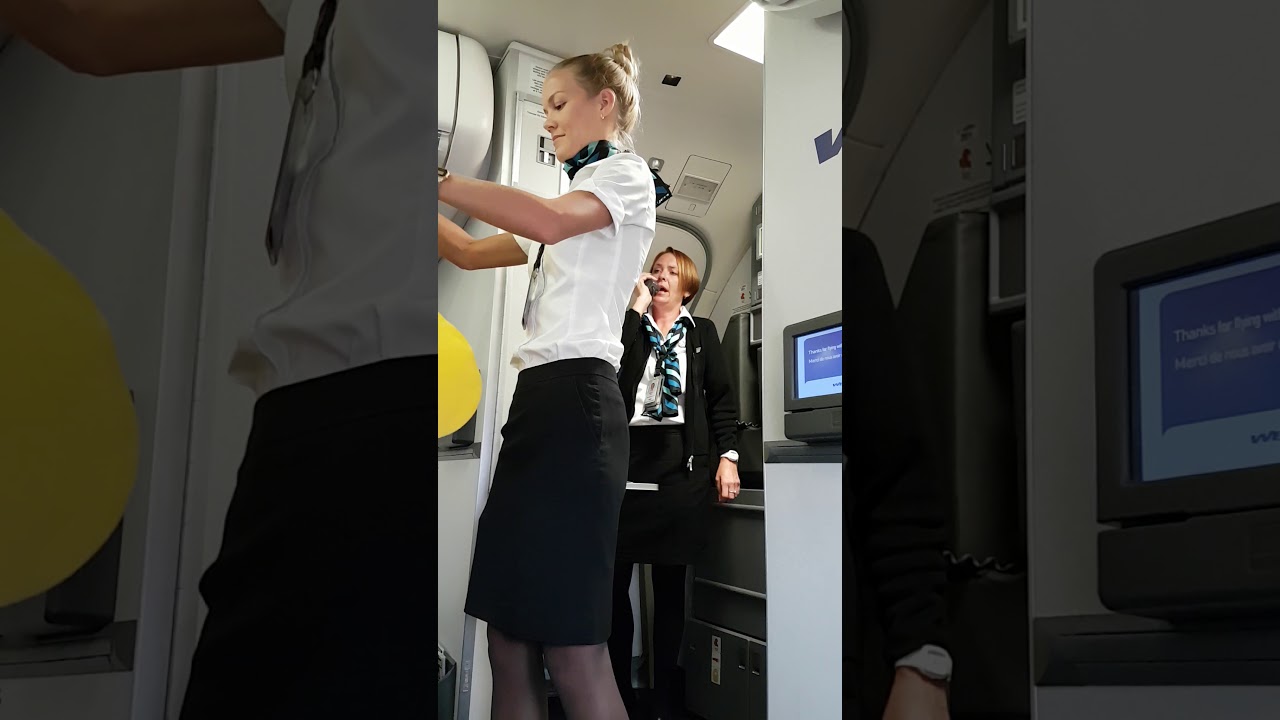 Flight attendant has us laughing before we take off - YouTube