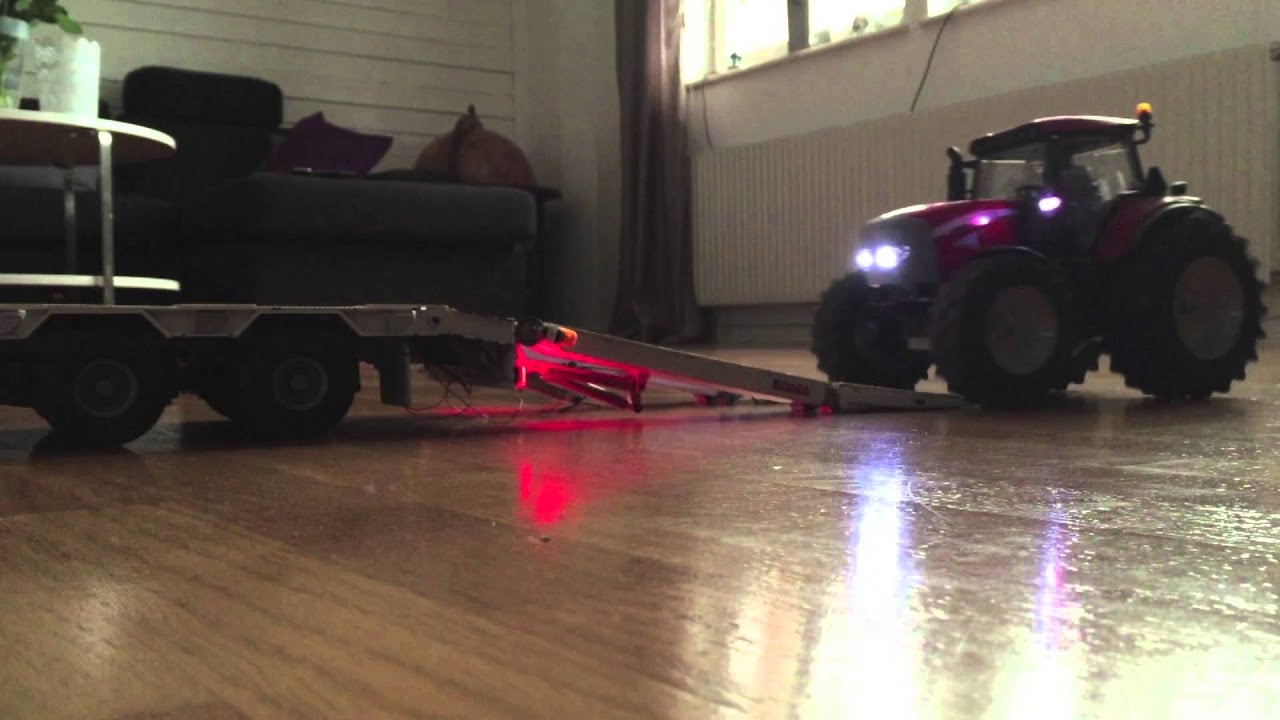 Carson Goldhofer Trailer w. Motorized loading ramps - YouTube