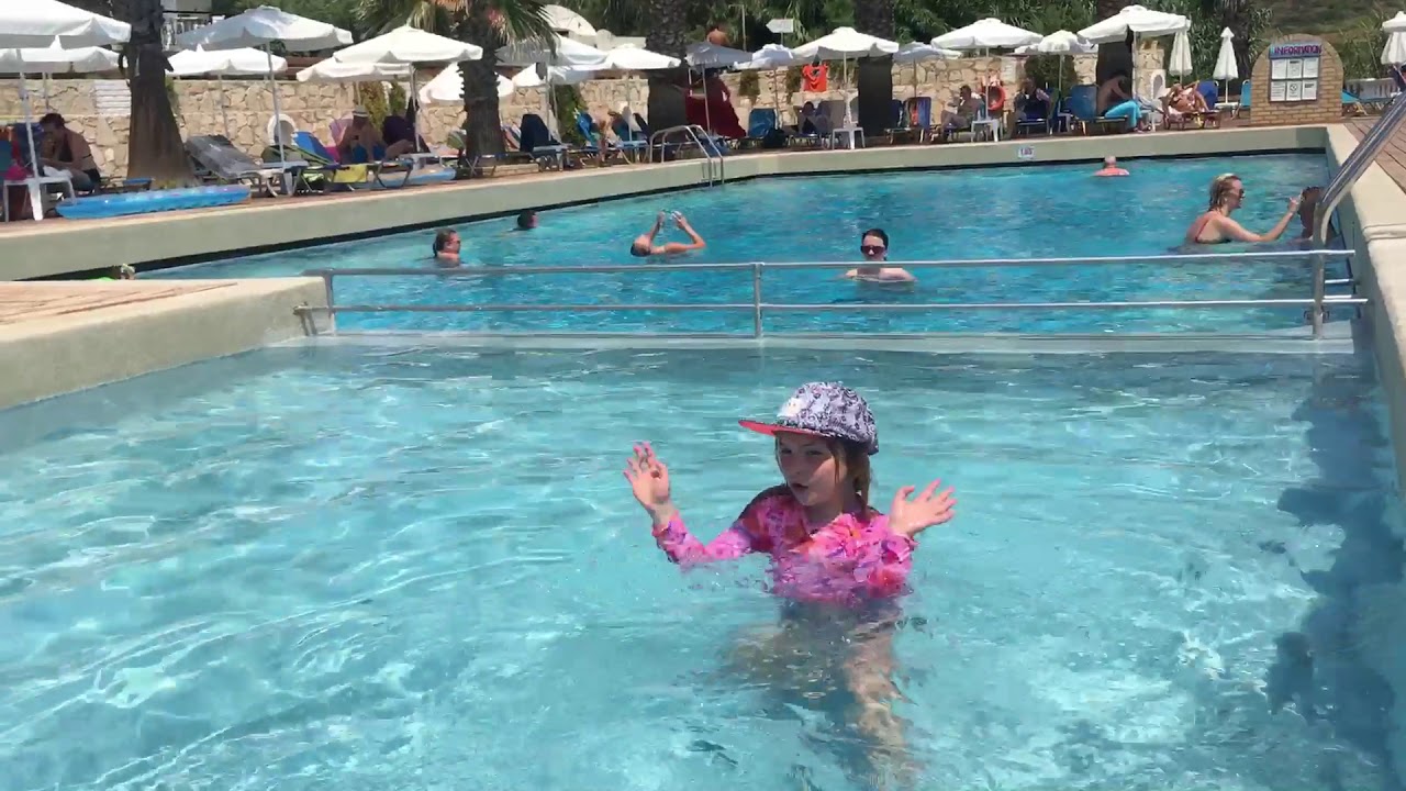 Handstand in swimming pool zante Greece - YouTube