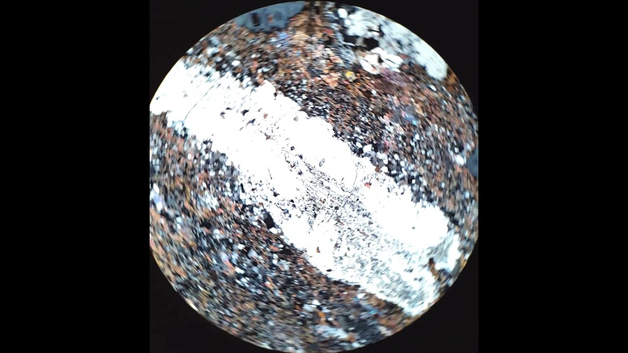 Andalusite tutorial Optical mineralogy - YouTube