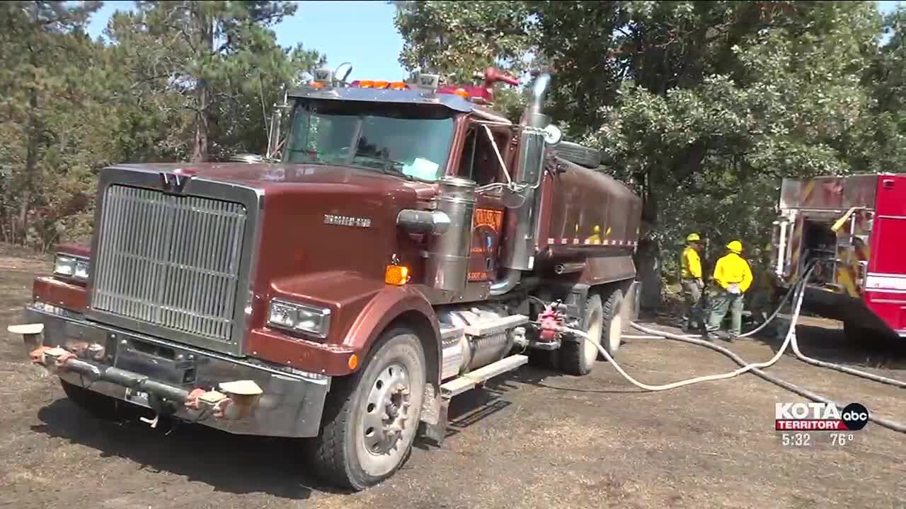 Fire crews receiving assistance from independent contractor at First ...