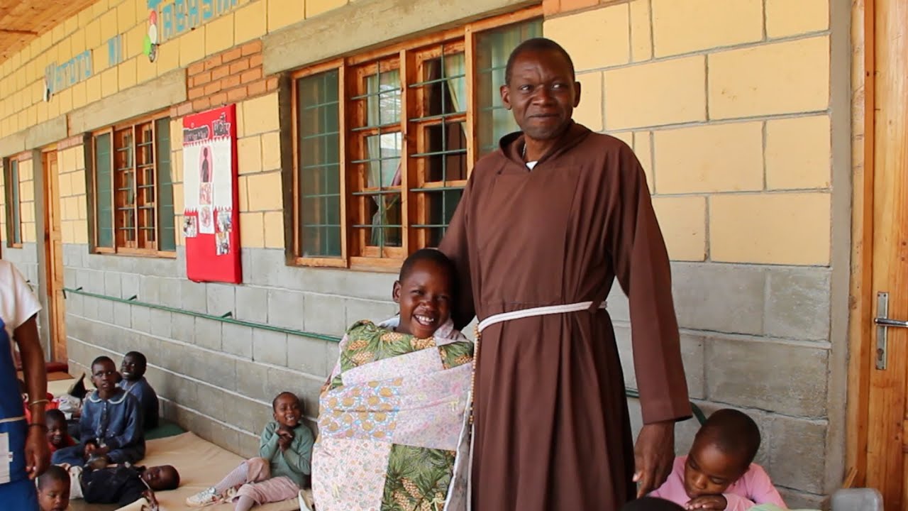 Father Tarimo says "Thank You" for Mission Quilts - YouTube