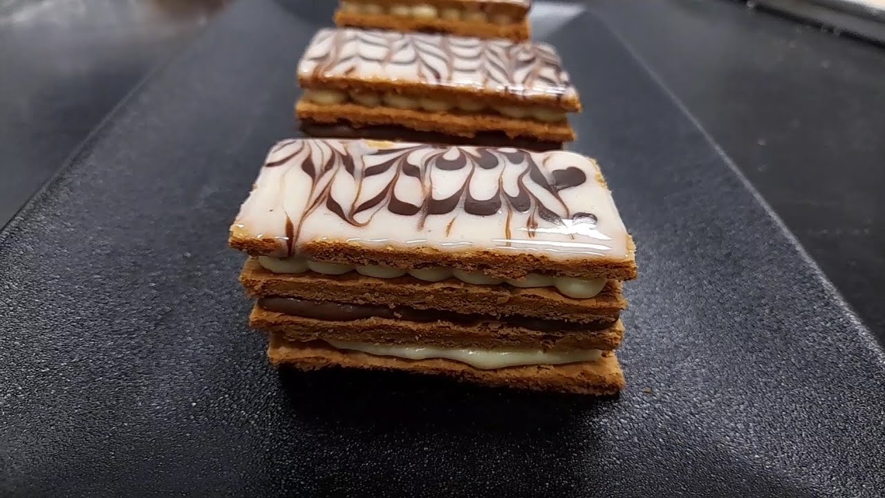 Mille-feuille is a French dessert made of puff pastry layered with ...